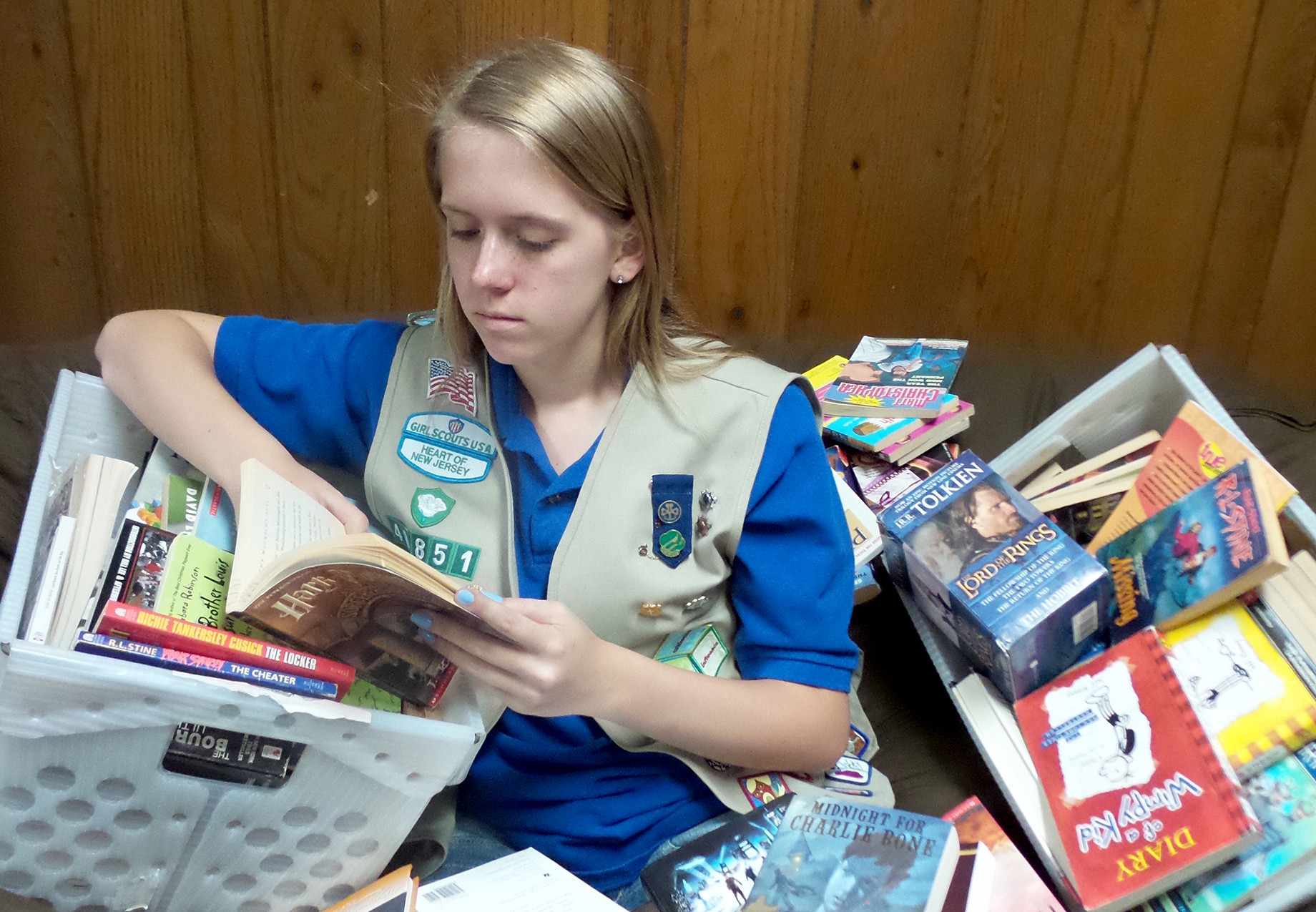 Renna Media | Girl Scout Collecting Books For 5th Grade Students