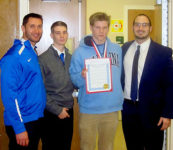 Sam Wustefeld and coaches | Renna Media